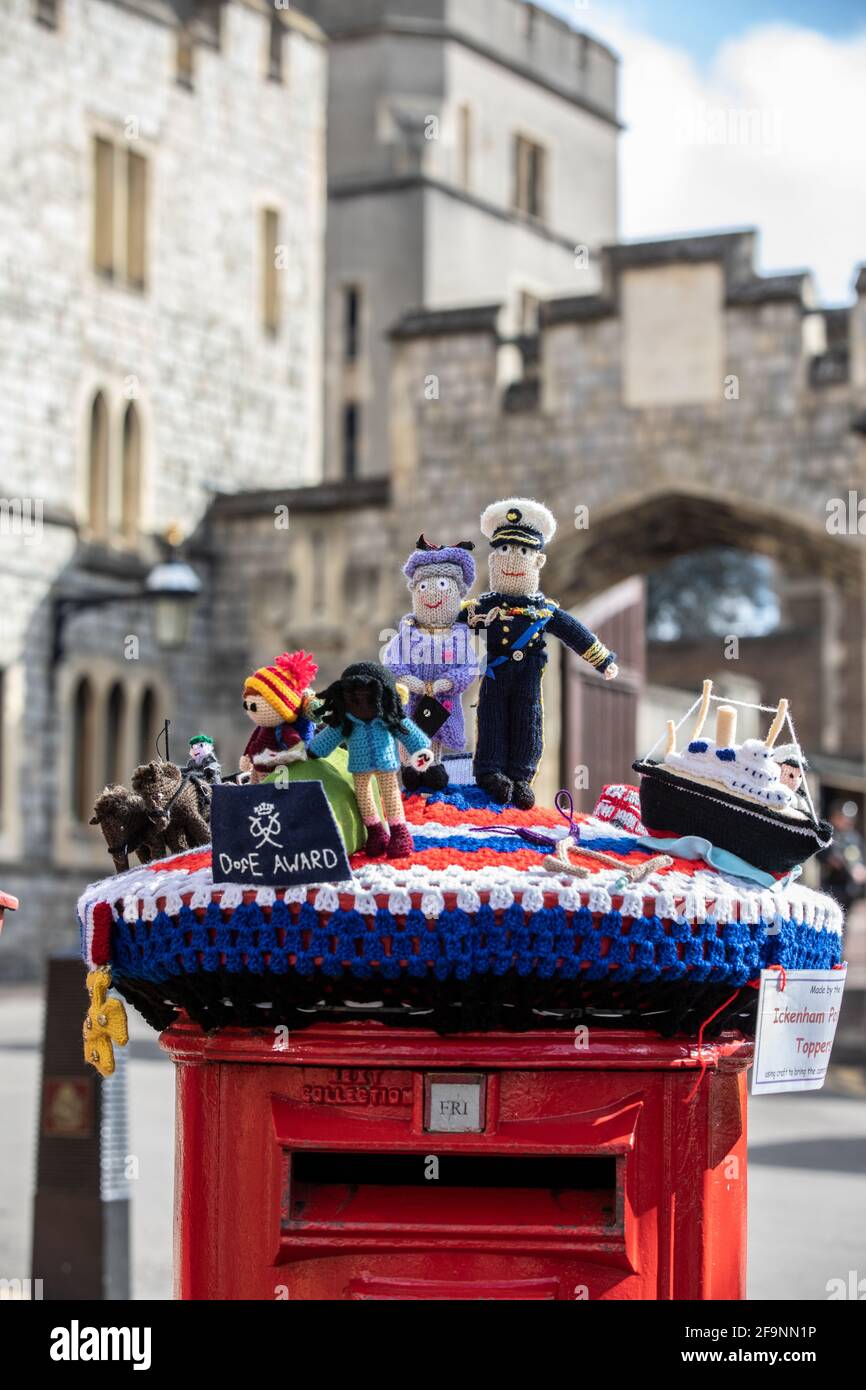 Knitted figures of Queen Elizabeth and Prince Philip on top of a ...