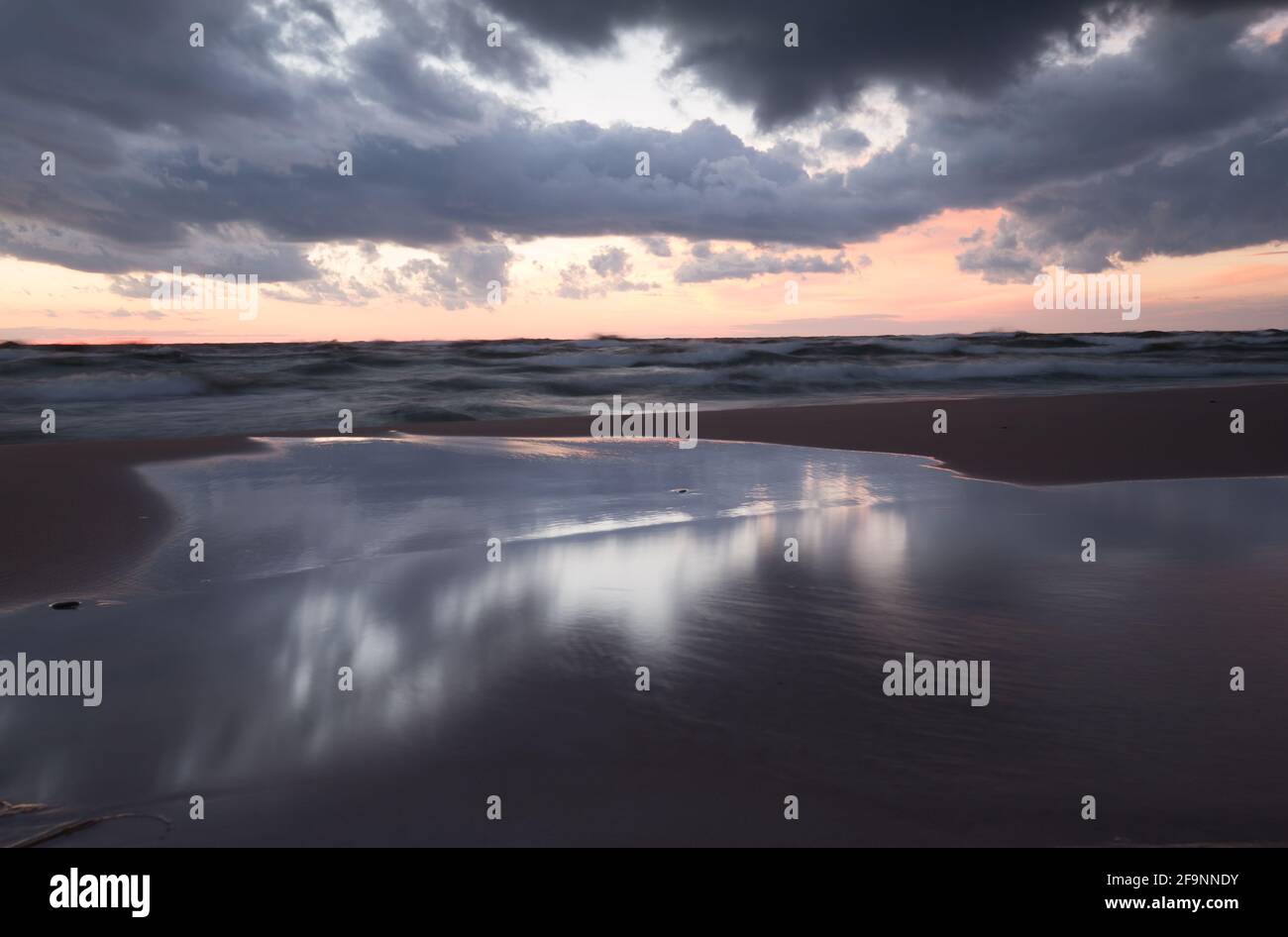 Sunset at the beach Stock Photo - Alamy