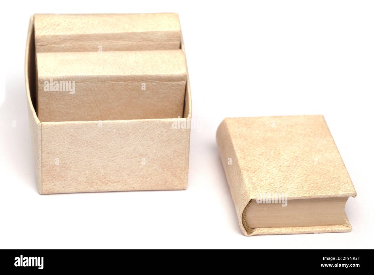 Three books over white background Stock Photo - Alamy