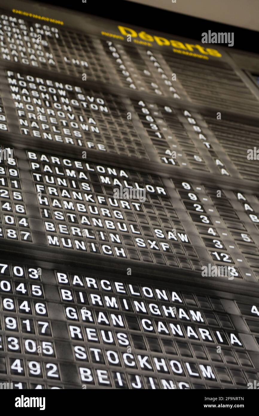 Airport departure board in terminal with flight information Stock Photo ...