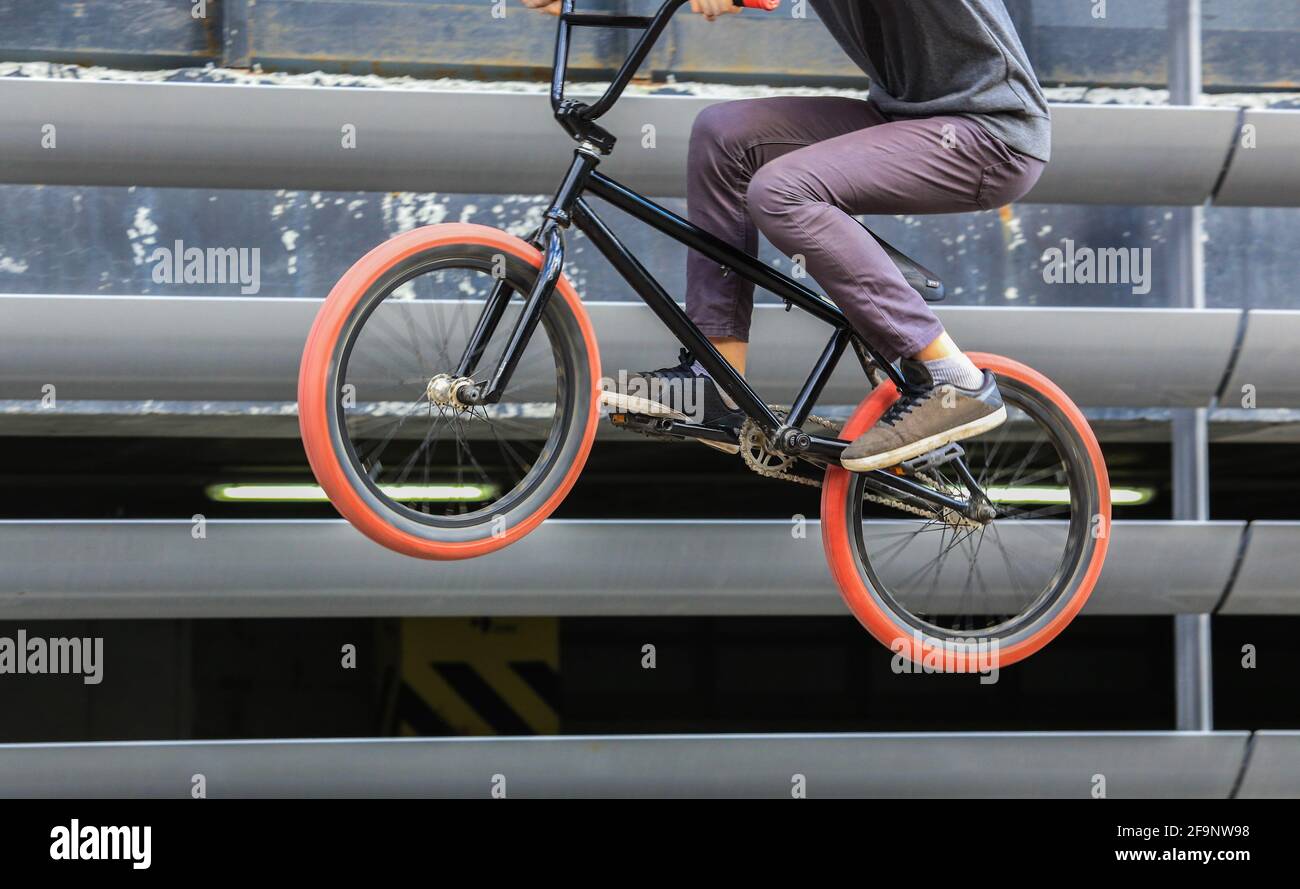 cyclist jump on bicycle closeup detail Stock Photo - Alamy