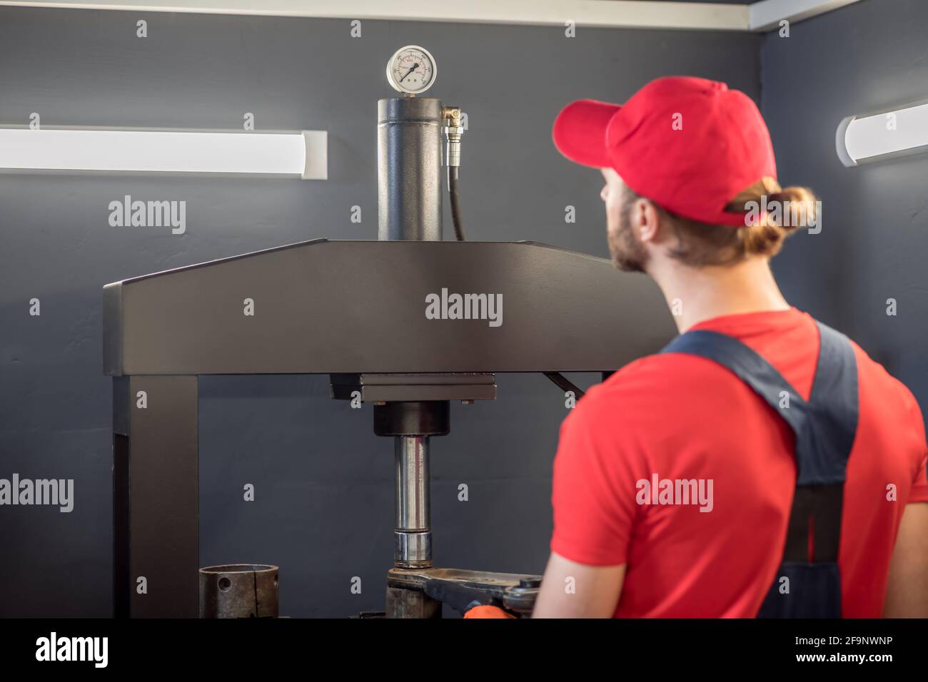 Man overalls back view hi-res stock photography and images - Alamy
