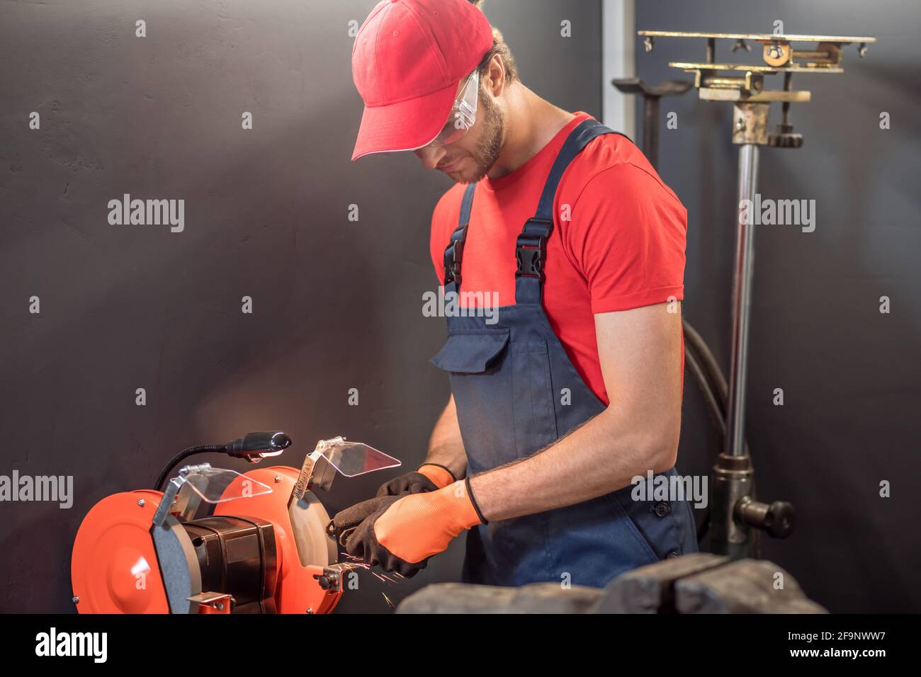 Red sharpening machine hi-res stock photography and images - Alamy