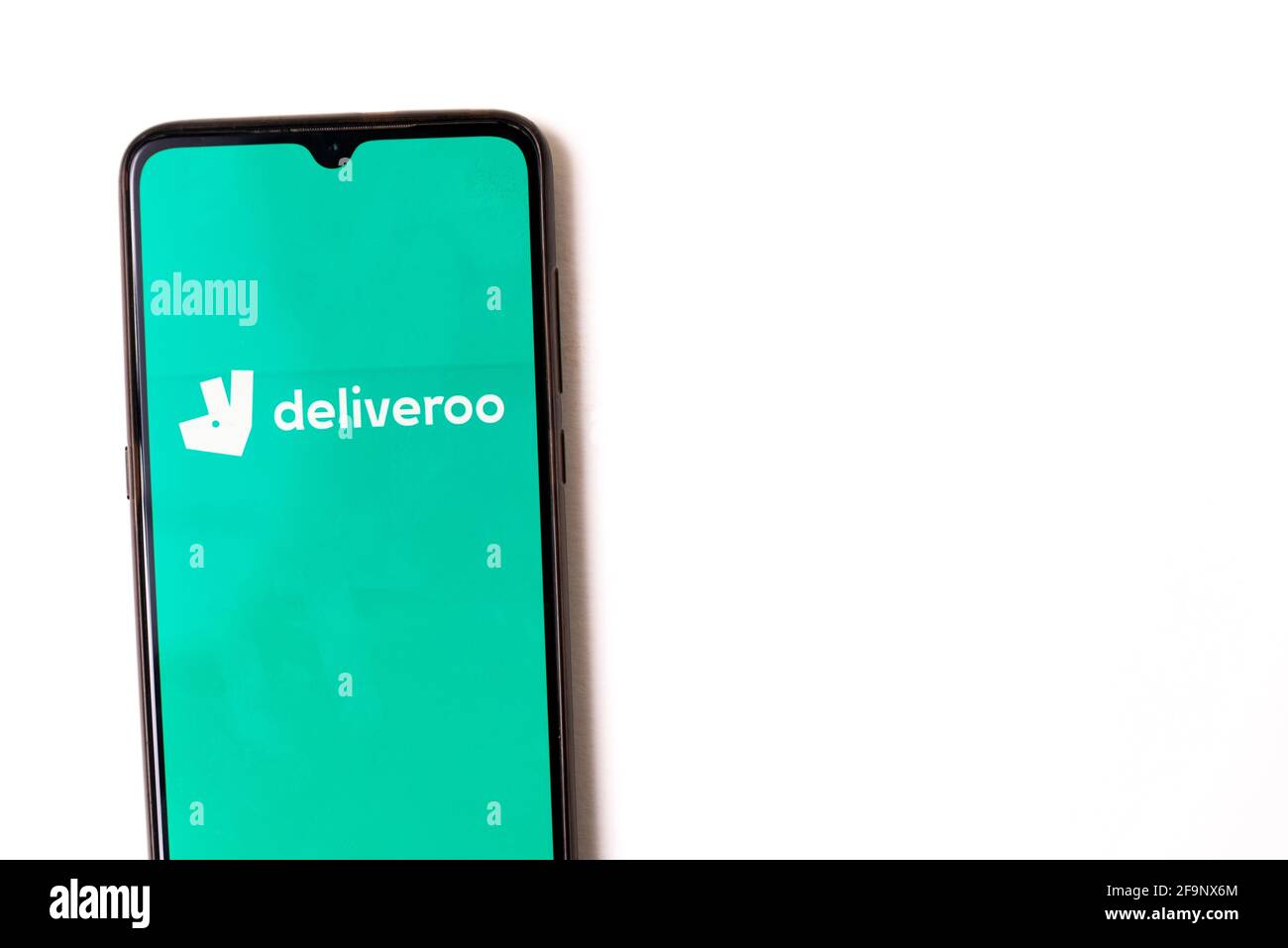 Deliveroo mobile app Cut Out Stock Images & Pictures - Alamy