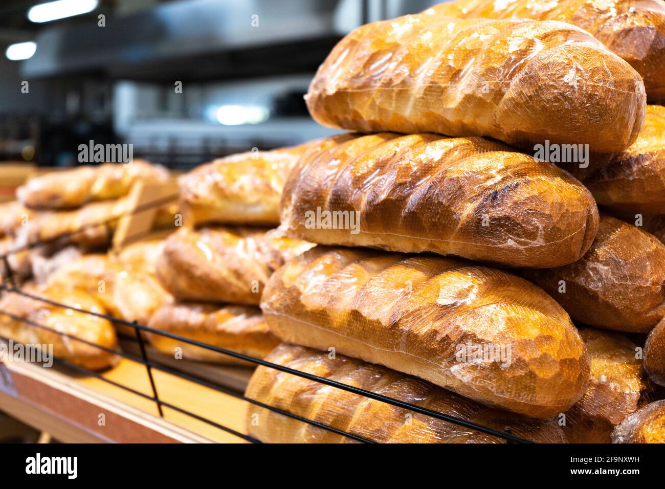 Lots of Large Fresh Bread Loaves in the Bakery Stock Photo - Alamy