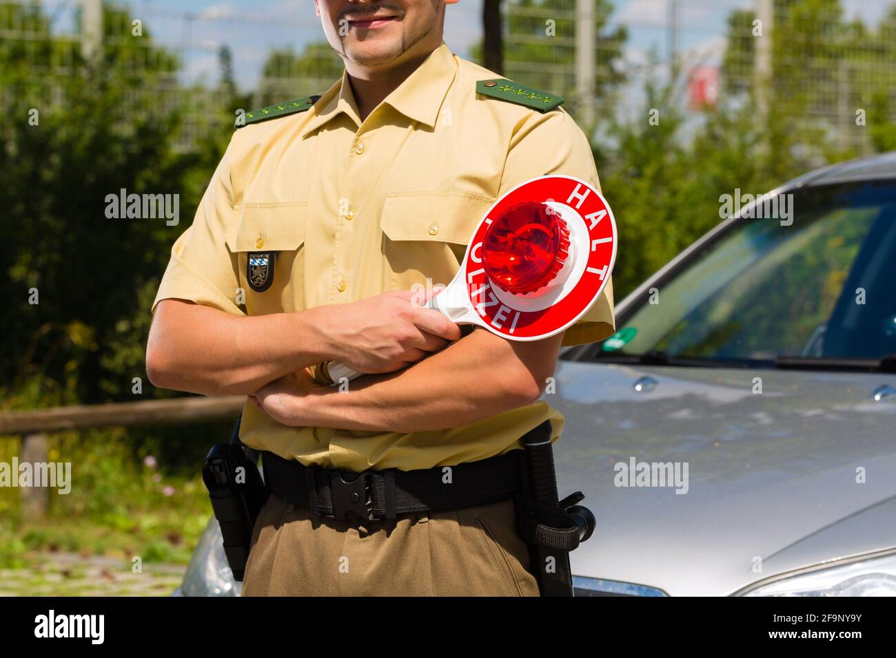 Police - policeman or cop in uniform stop car in traffic control Stock ...