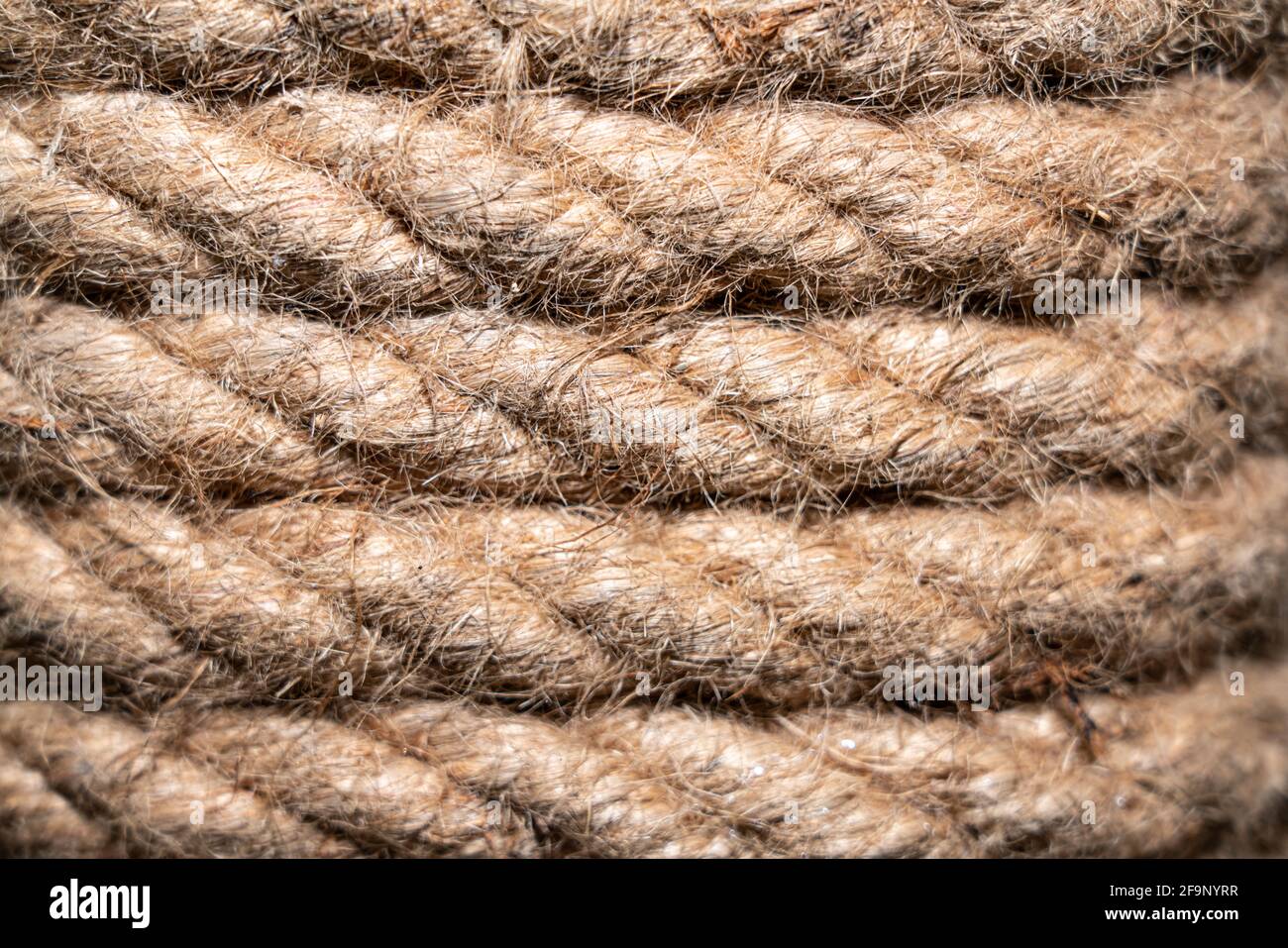 Brown rope coiled in layers as abstract background Stock Photo - Alamy