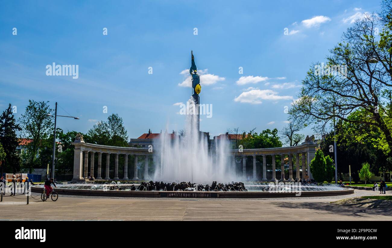 A fountain with a large sculpture of soldiers on a stele on the Soviet ...
