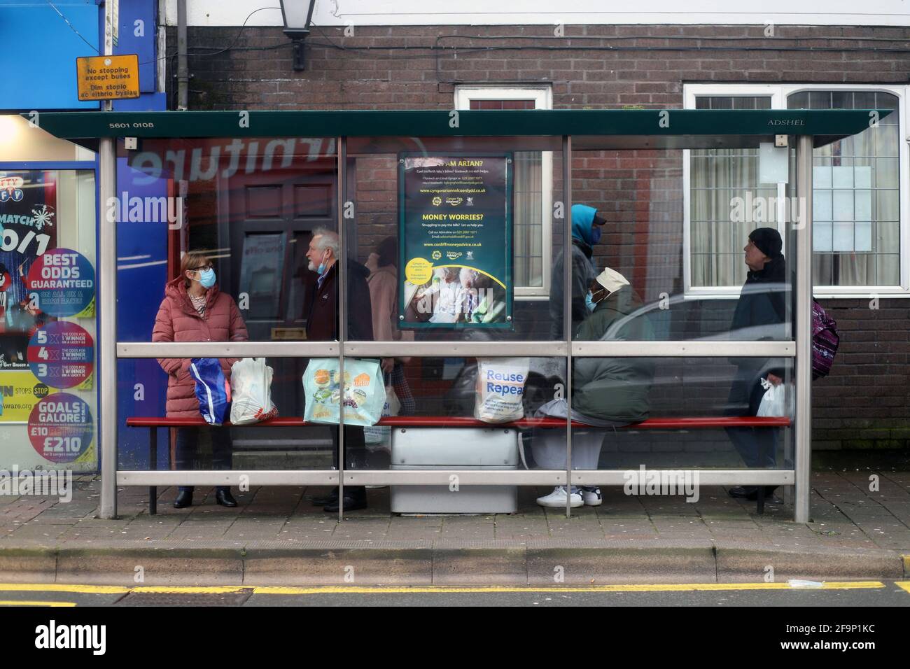 Admiral Napier bus stop, Canton, Cardiff. 28th January 2021. A group of ...