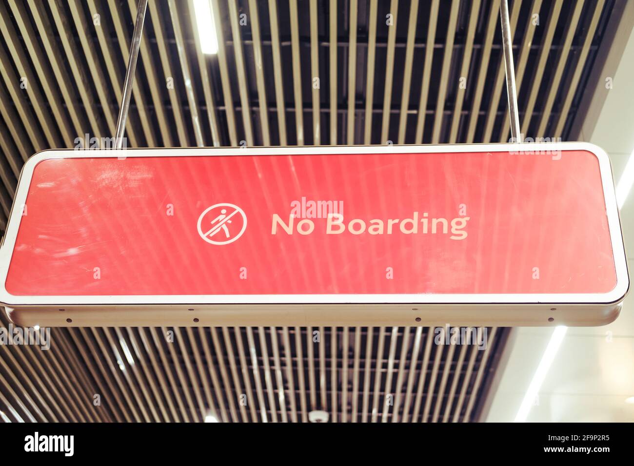 The inscription on the sign in the subway - no boarding, red background ...