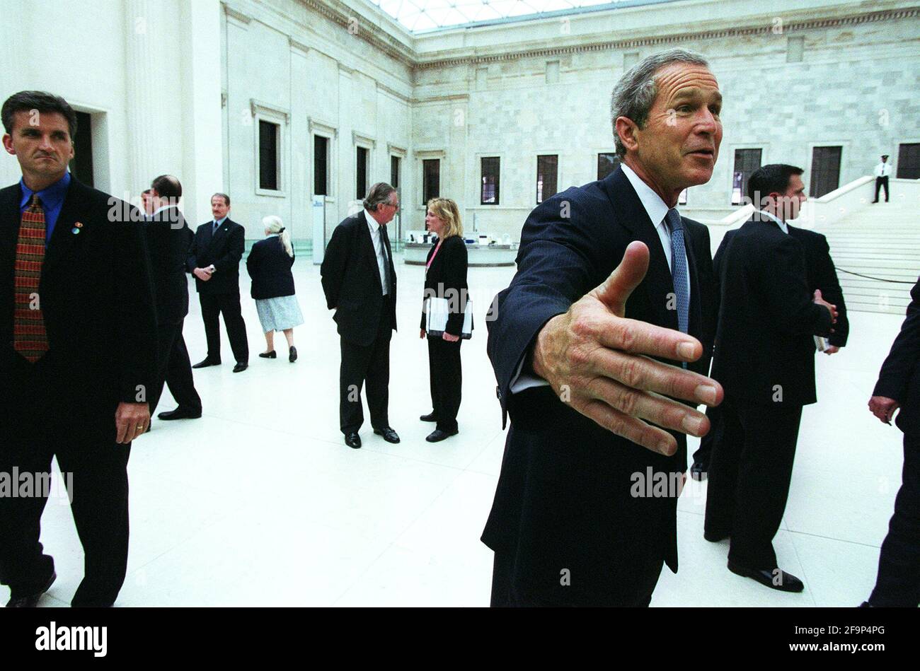 U.S. President George Bush makes a visit to the Reading Room at the ...