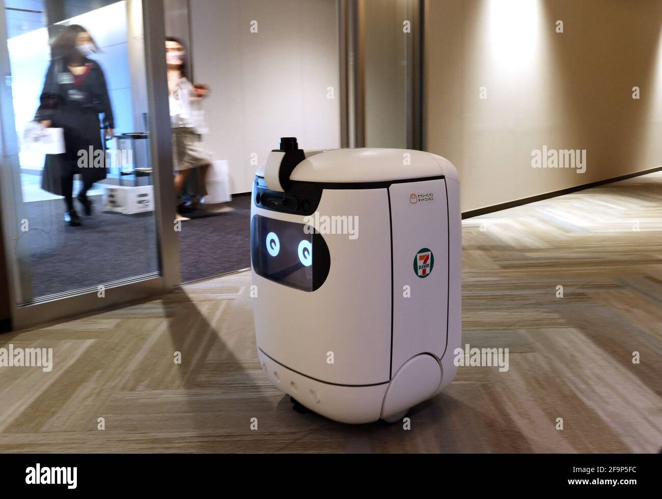 Tokyo, Japan. 20th Apr, 2021. An autonomous delivery robot "Rice ...