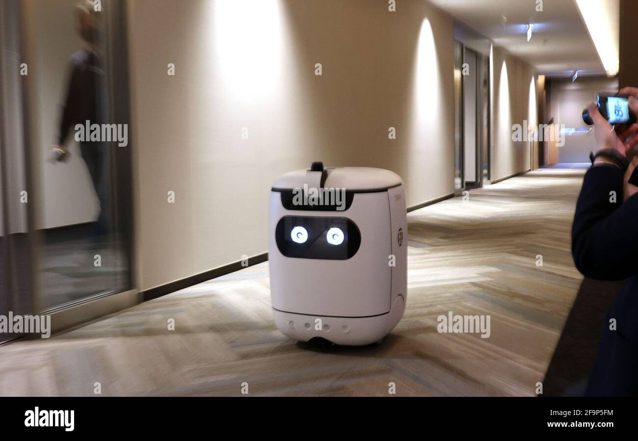 Tokyo, Japan. 20th Apr, 2021. An autonomous delivery robot "Rice ...