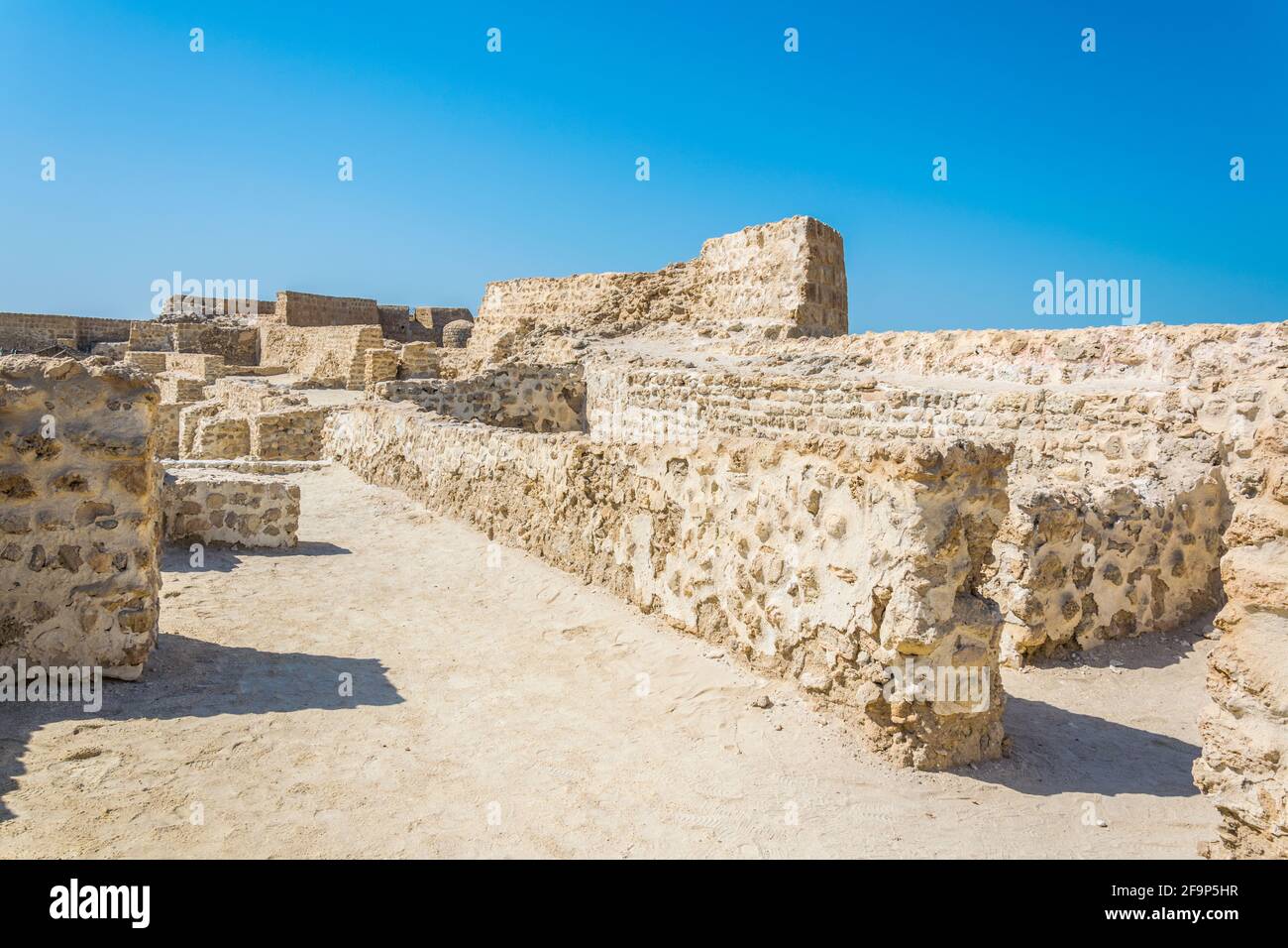 Interior of the Bahrain fort complex with the Qal'At Al Bahrain fort ...