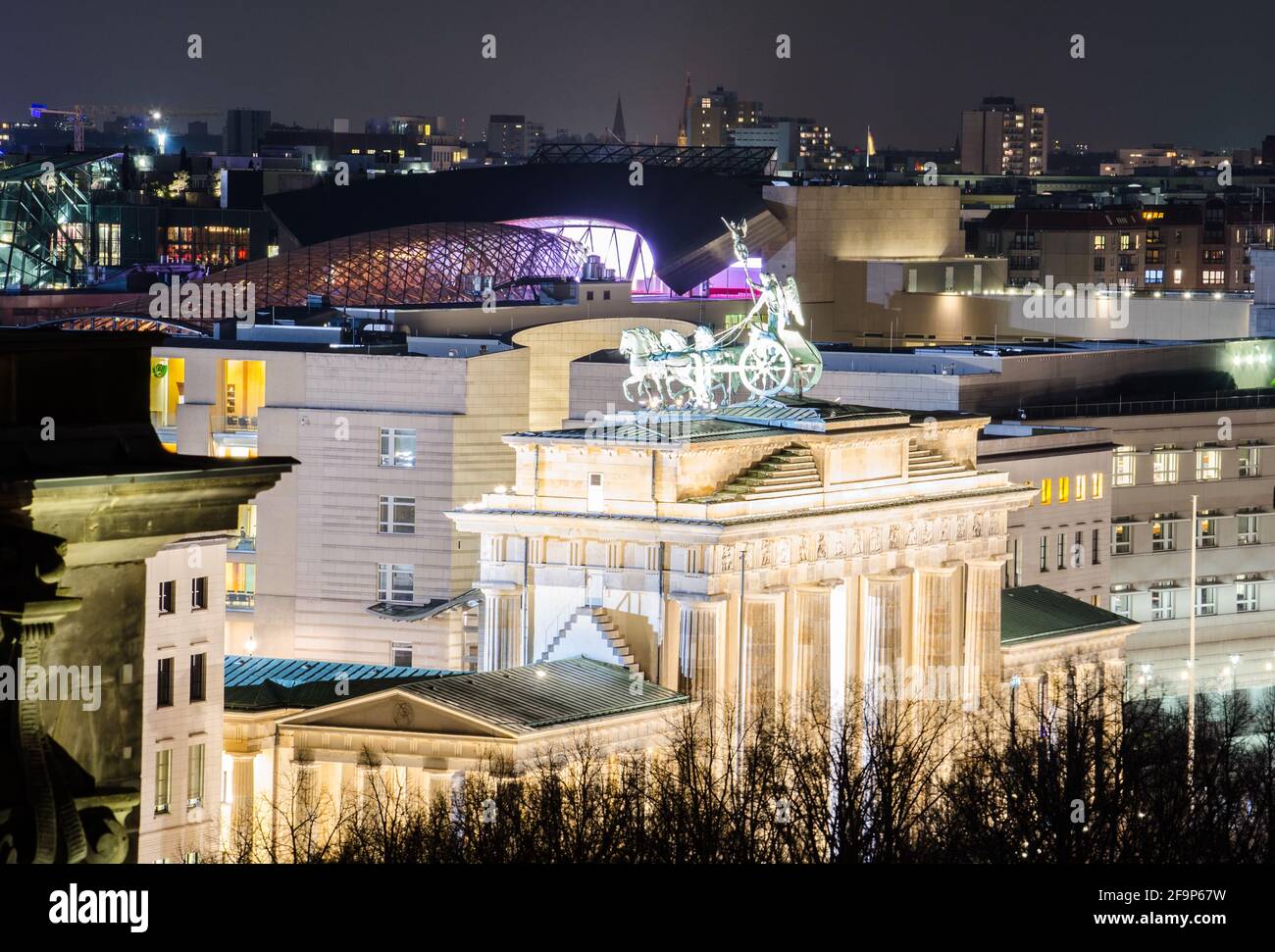 view of the illuminated brandenburger tor taken from terrace of the ...