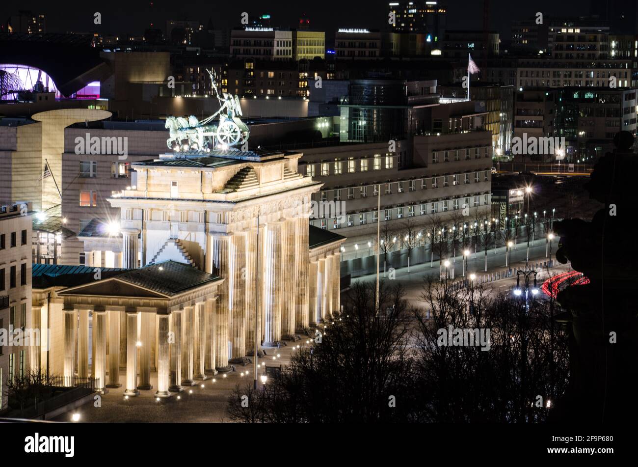 view of the illuminated brandenburger tor taken from terrace of the ...