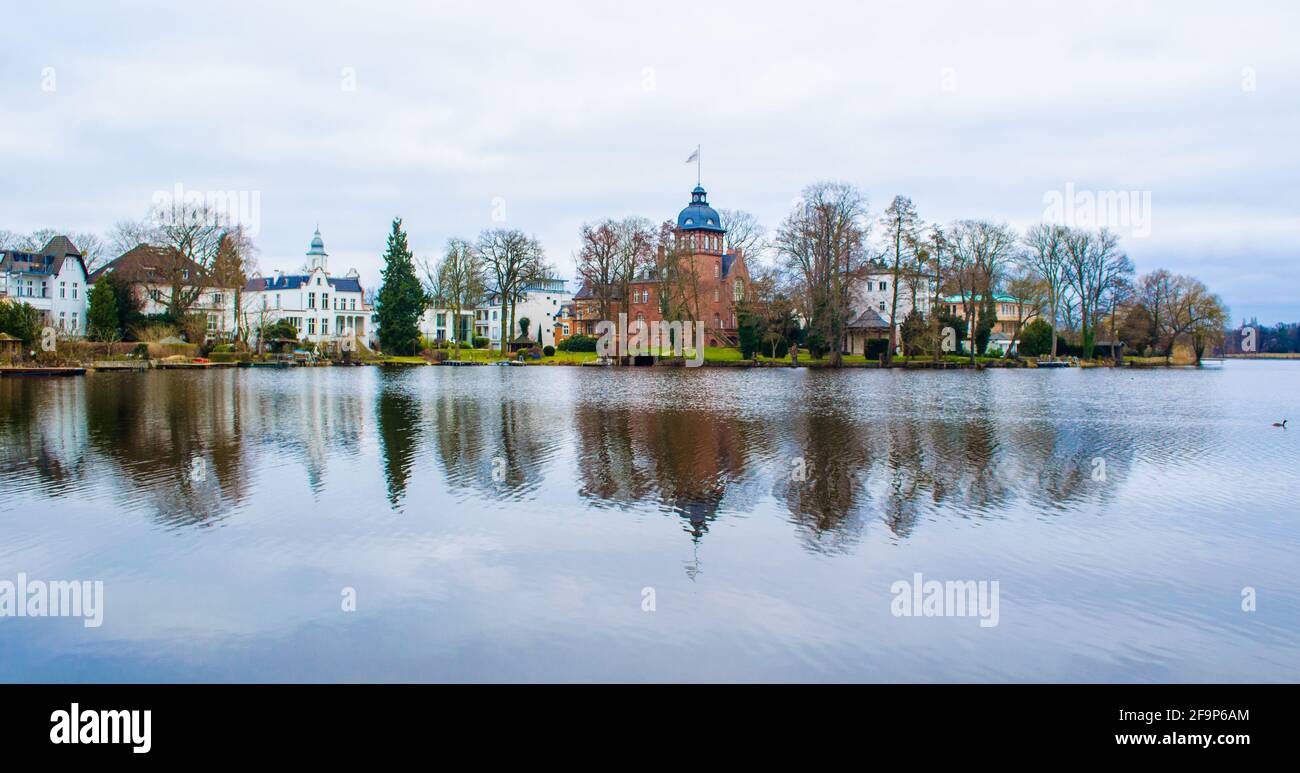 view of villas situated on the shore of heiliger see in potsdam ...