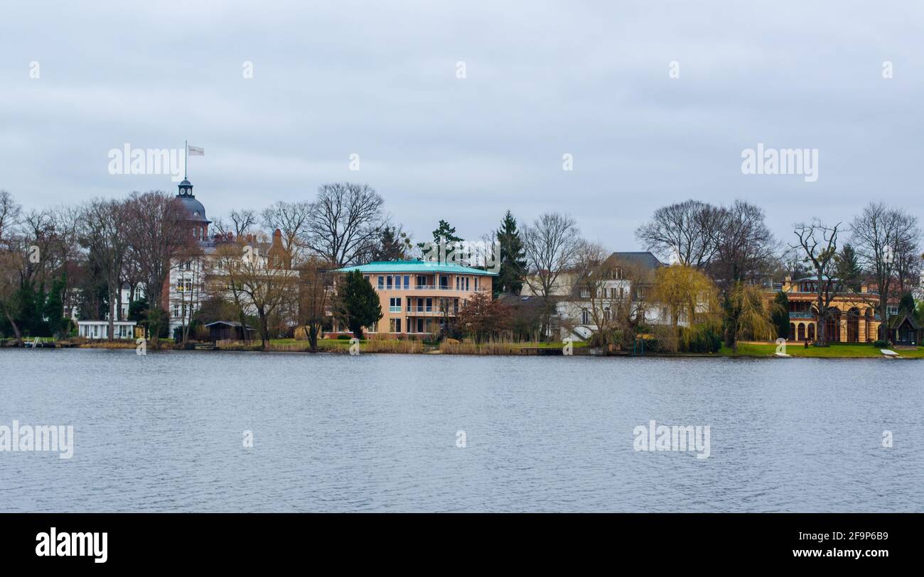 view of villas situated on the shore of heiliger see in potsdam ...