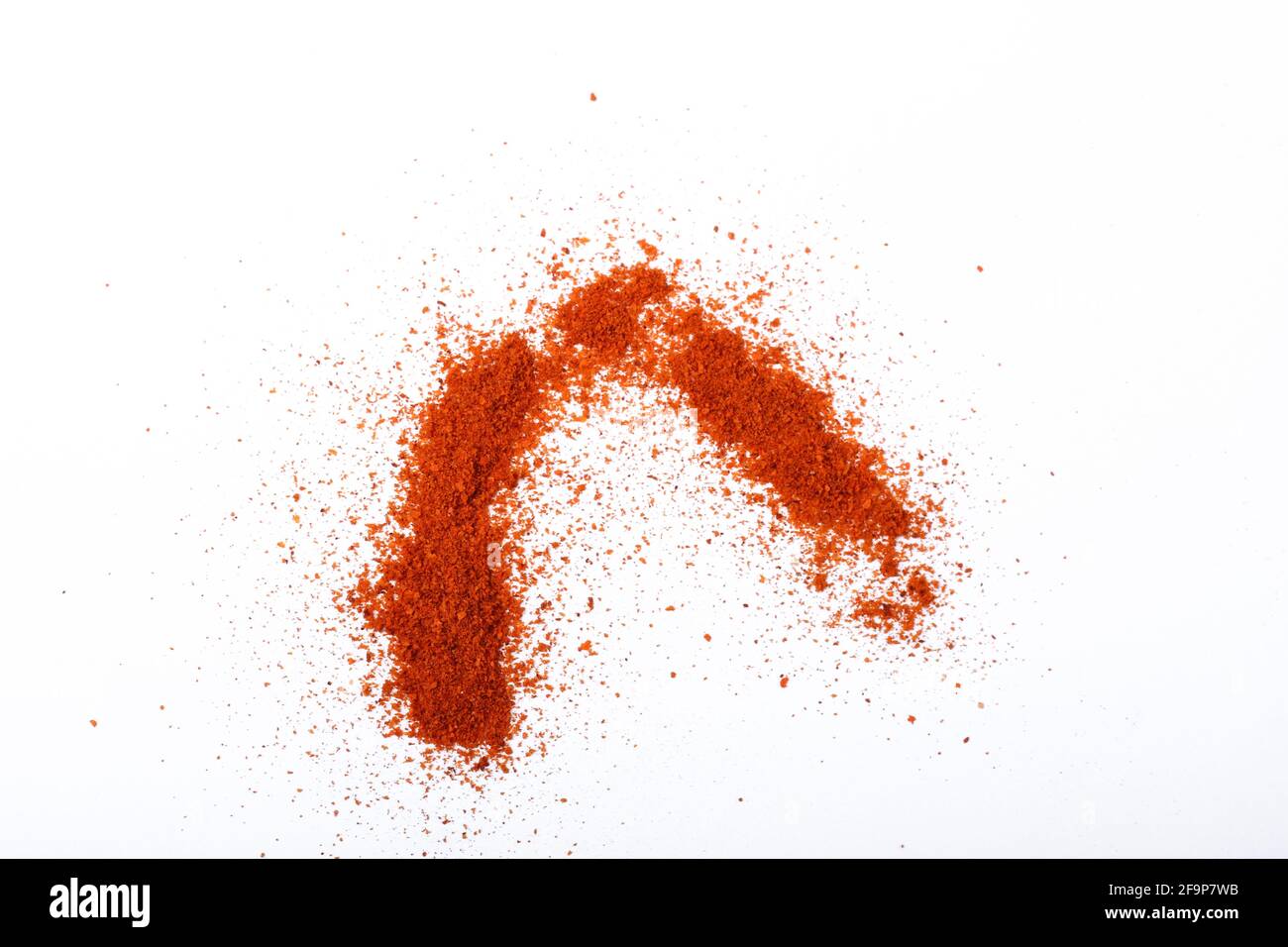 Pile of red paprika powder isolated on white background and texture ...