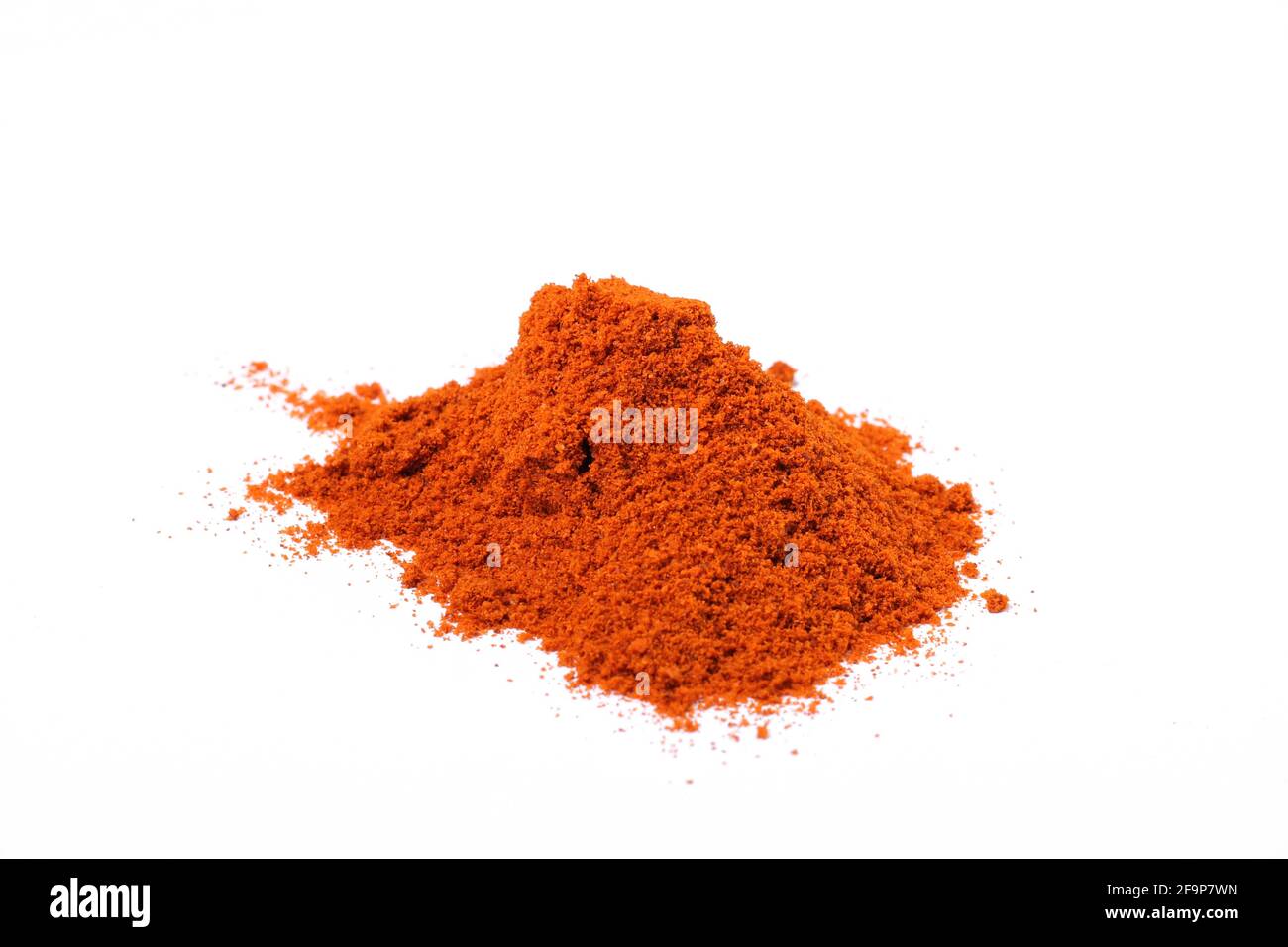 Pile of red paprika powder isolated on white background and texture ...