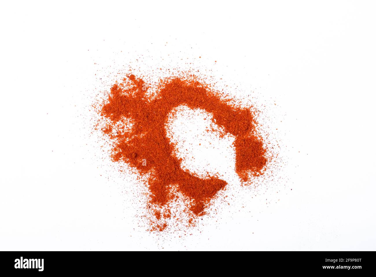Pile of red paprika powder isolated on white background and texture ...