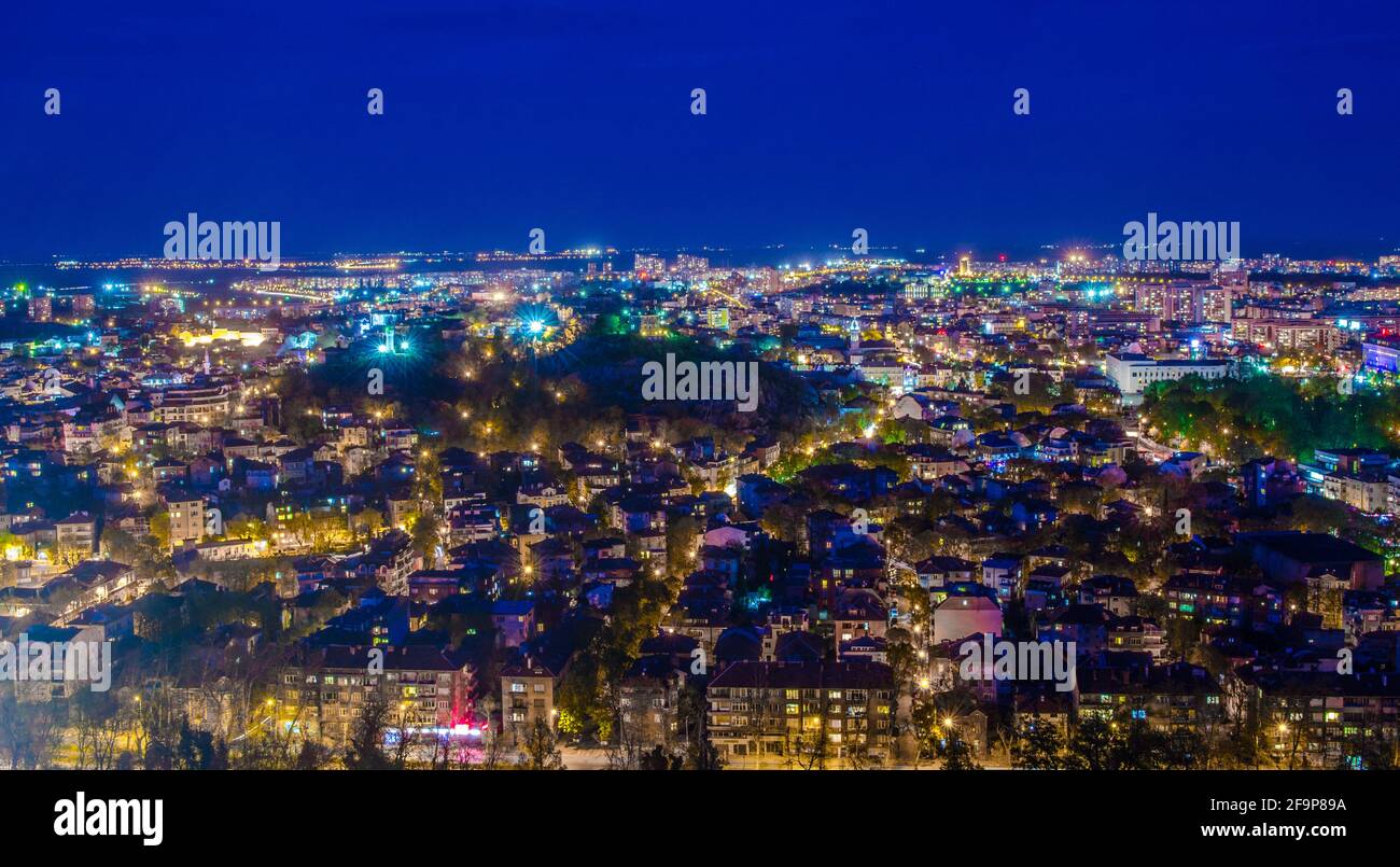 night view over illuminated bulgarian city plovdiv taken from the top ...