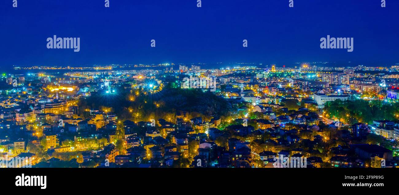 night view over illuminated bulgarian city plovdiv taken from the top ...