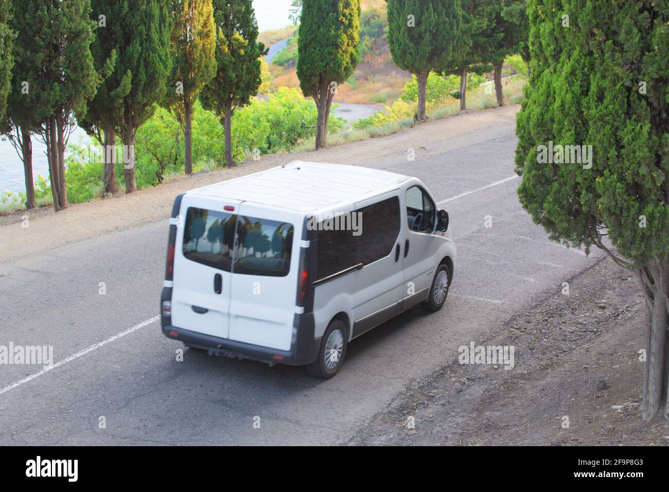 White minibus on road hi-res stock photography and images - Alamy