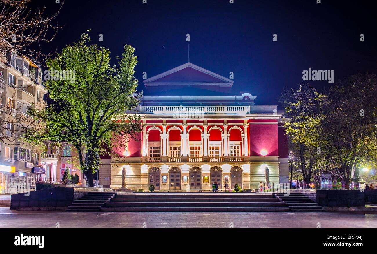 night view over building of bulgarian national opera house in rousse ...
