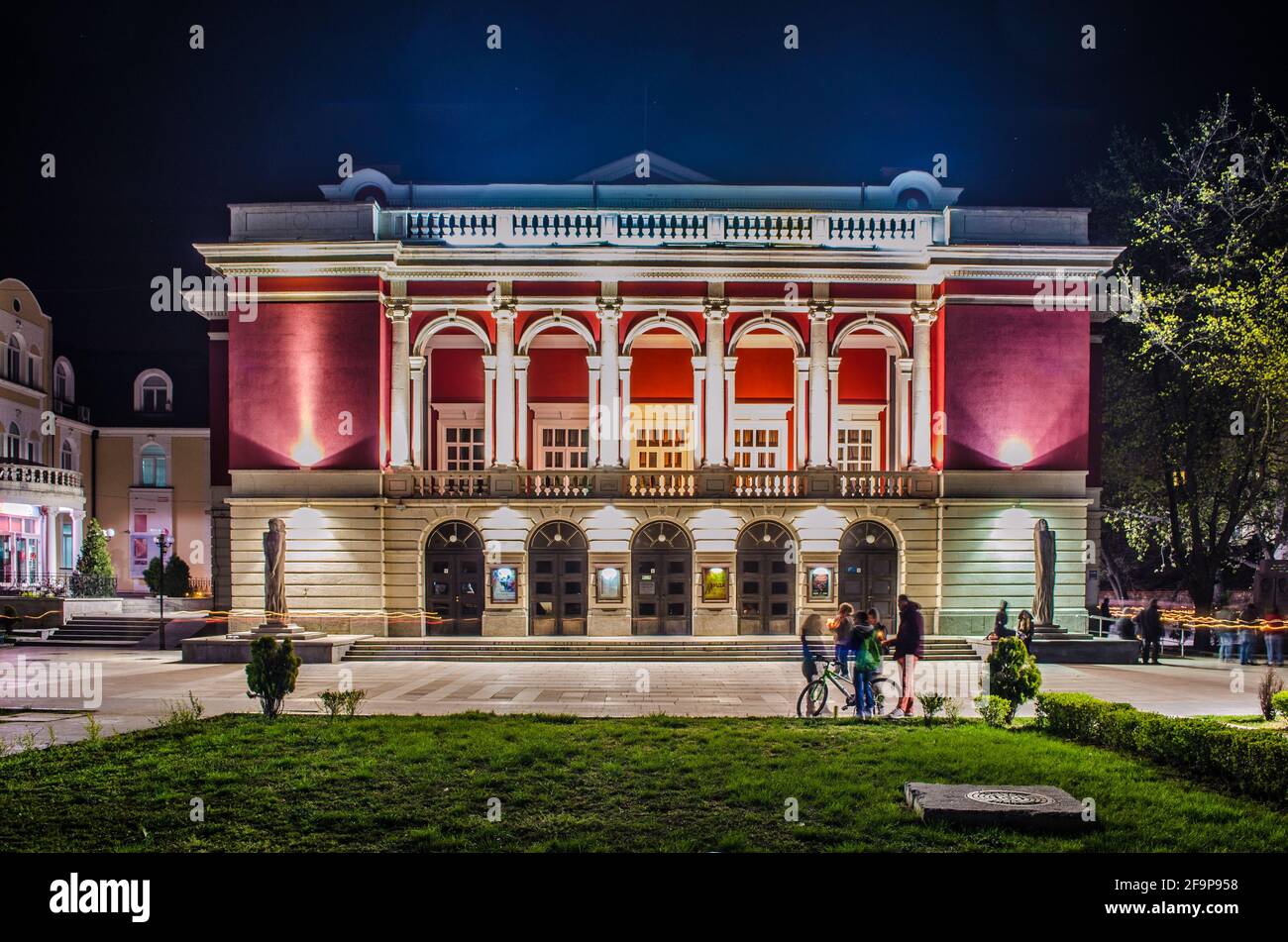 night view over building of bulgarian national opera house in rousse ...