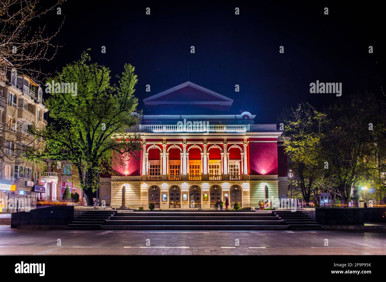 night view over building of bulgarian national opera house in rousse ...