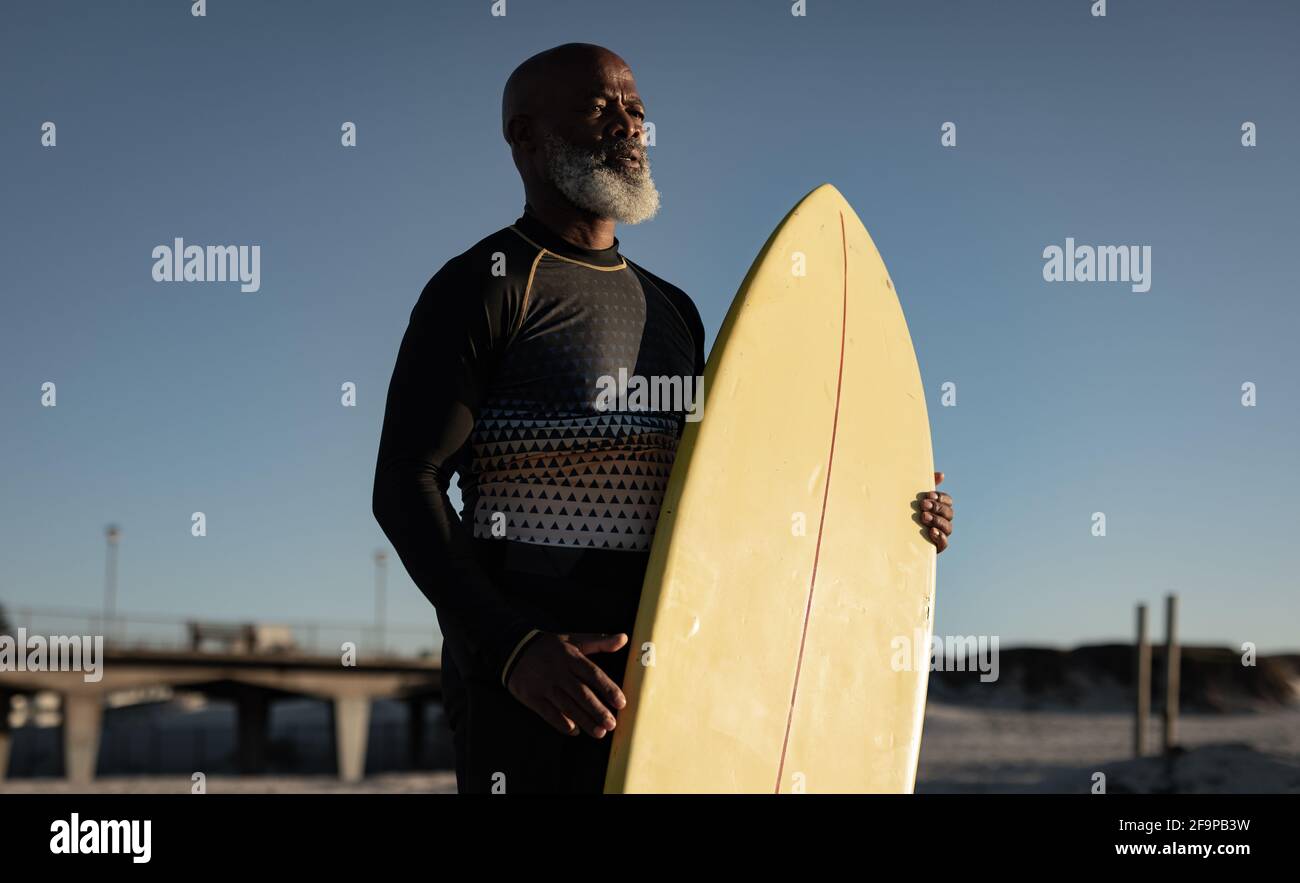 Mature male surfer standing hi-res stock photography and images - Alamy