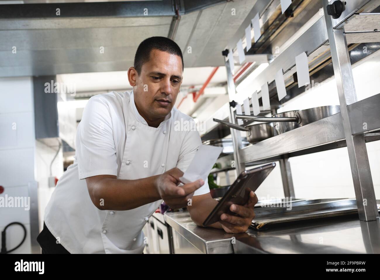 Restaurant manager chef order hi-res stock photography and images - Alamy