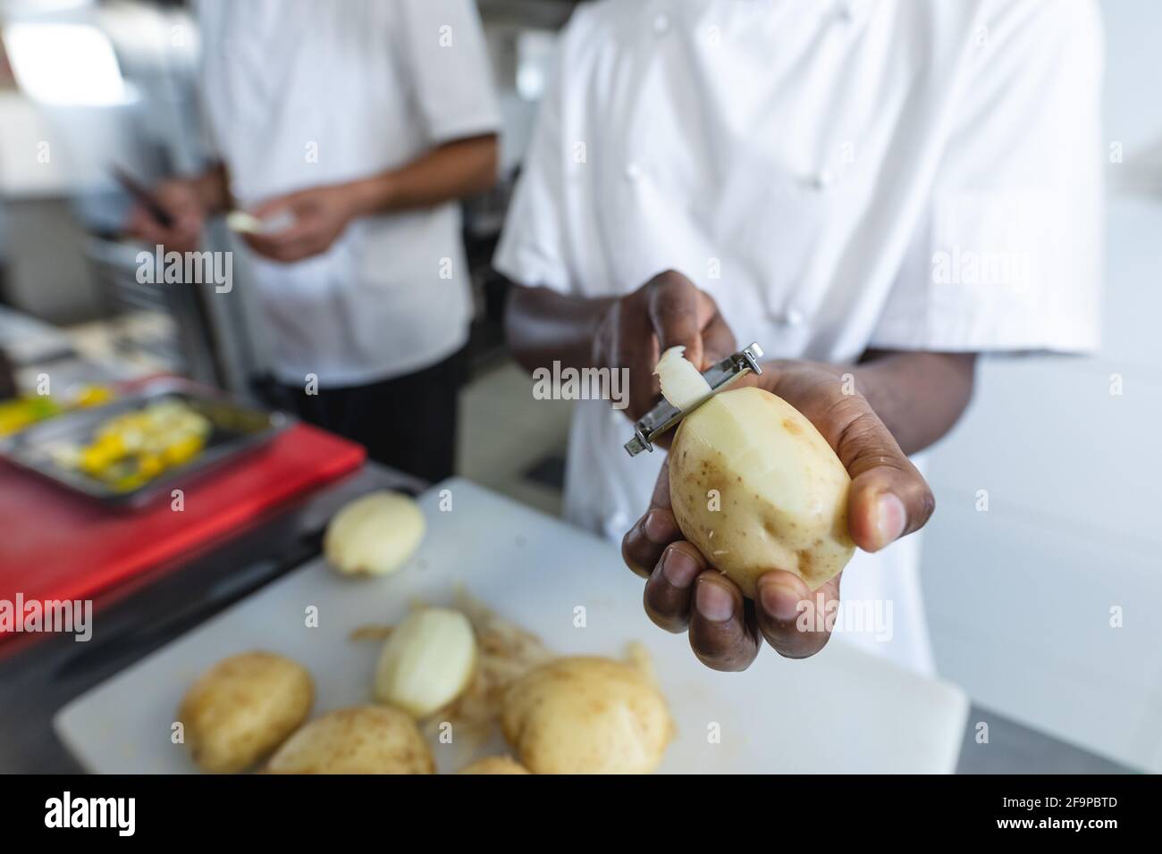 Midsection mixed race male chef hi-res stock photography and images - Alamy