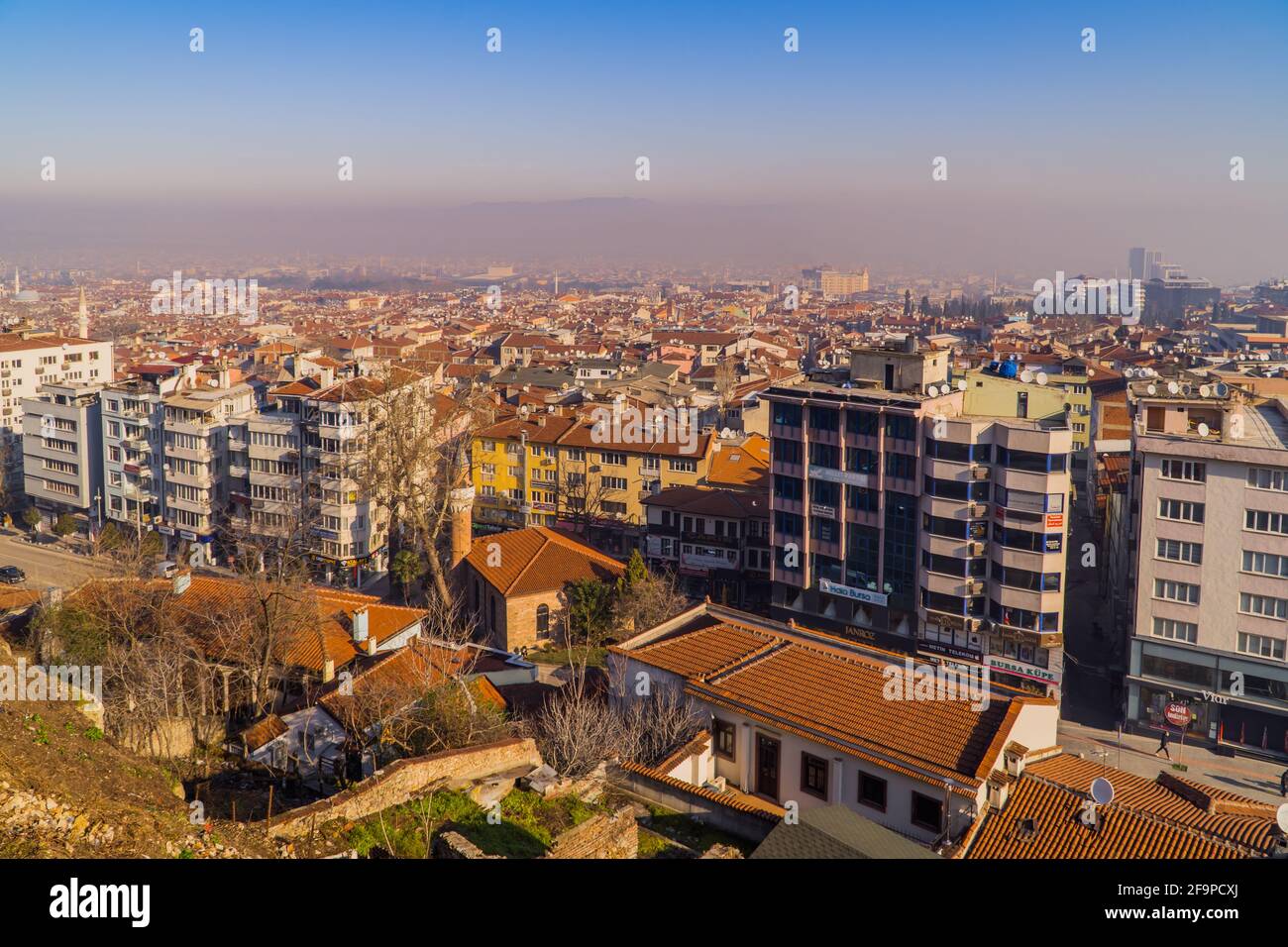 Aerial view of the city of Bursa, Turkey at sunset seen from Hisar ...