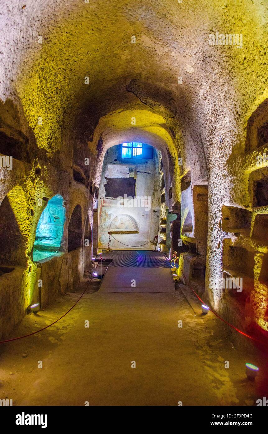 view of interior of famous tourist attraction in naples - catacombs of ...