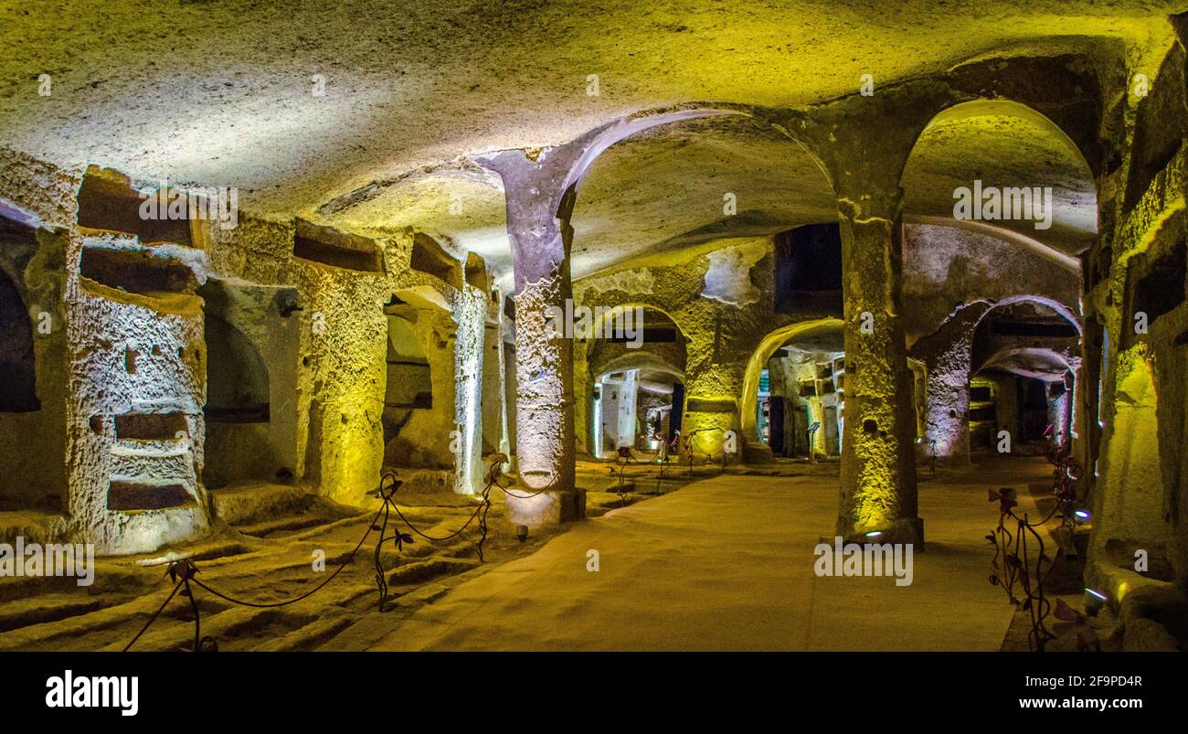 view of interior of famous tourist attraction in naples - catacombs of ...