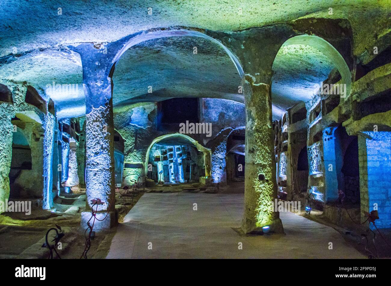 view of interior of famous tourist attraction in naples - catacombs of ...