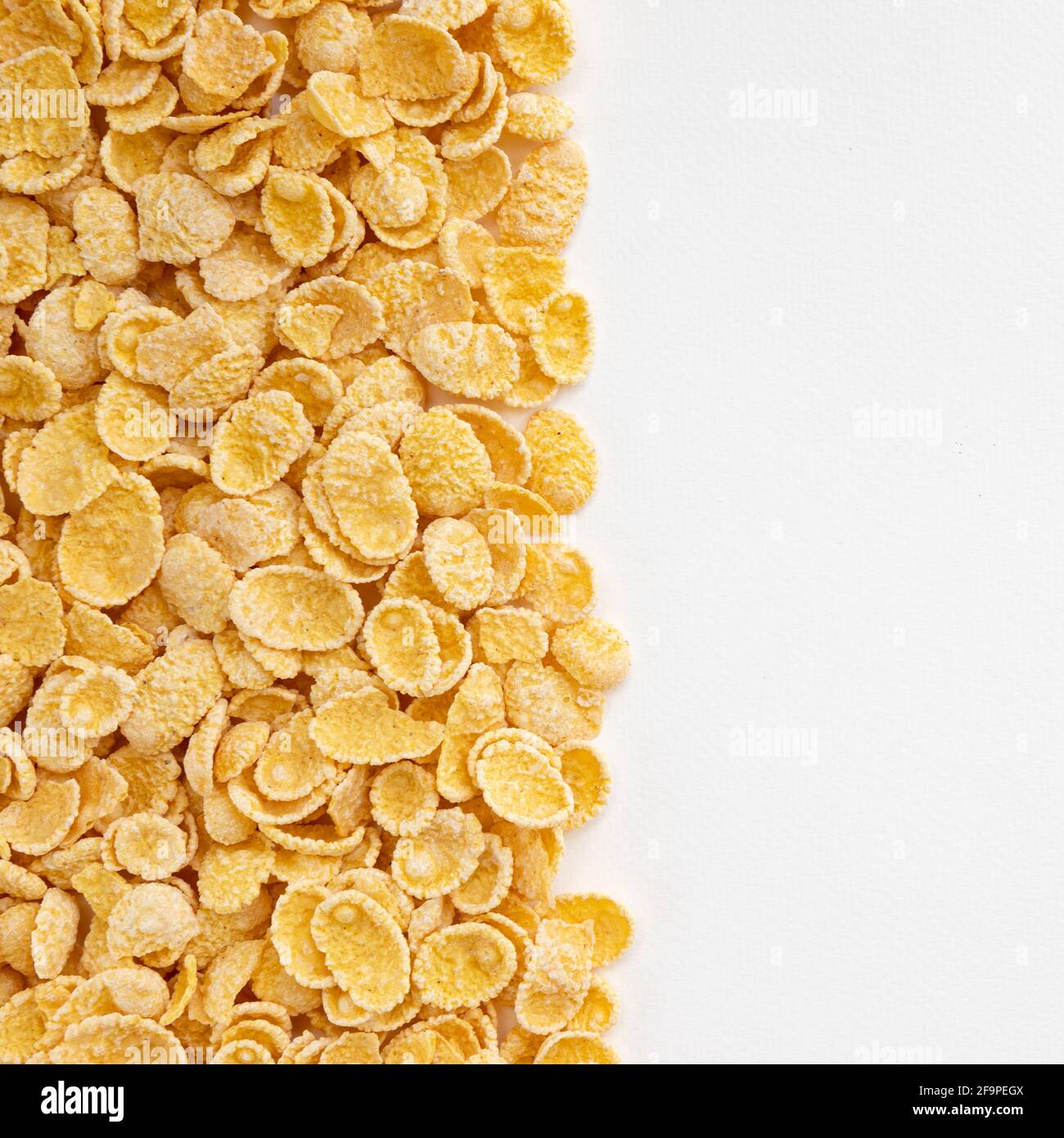 corn flakes background, frame of cornflakes and empty space for text on ...