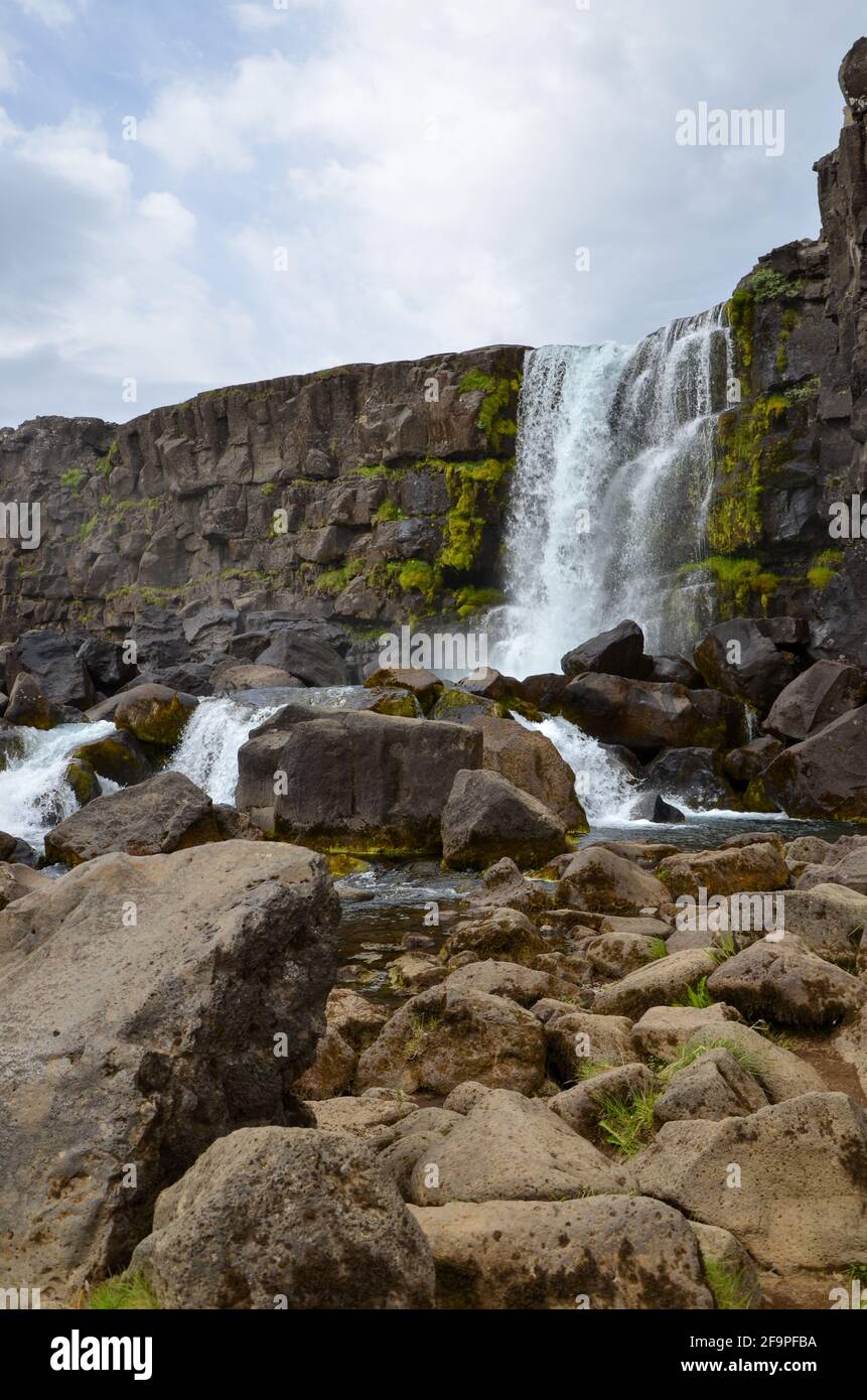 Stunning view of a foamy wide Oxarafoss waterfall in Thingvellir ...