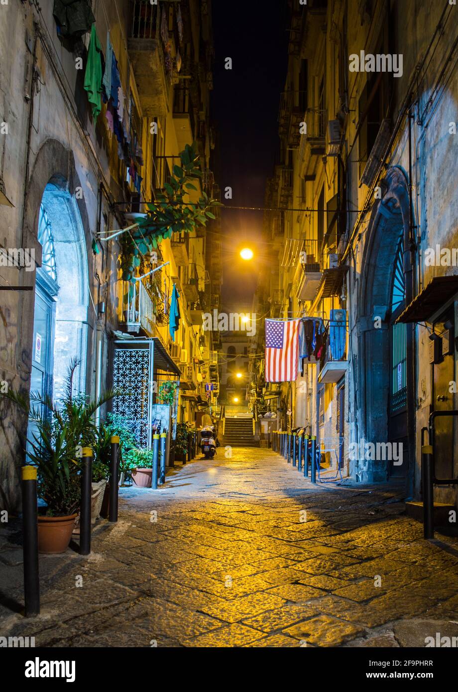 night view of illuminated street leading through the historical center ...