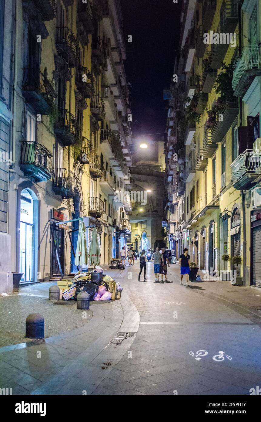 night view of illuminated street leading through the historical center ...