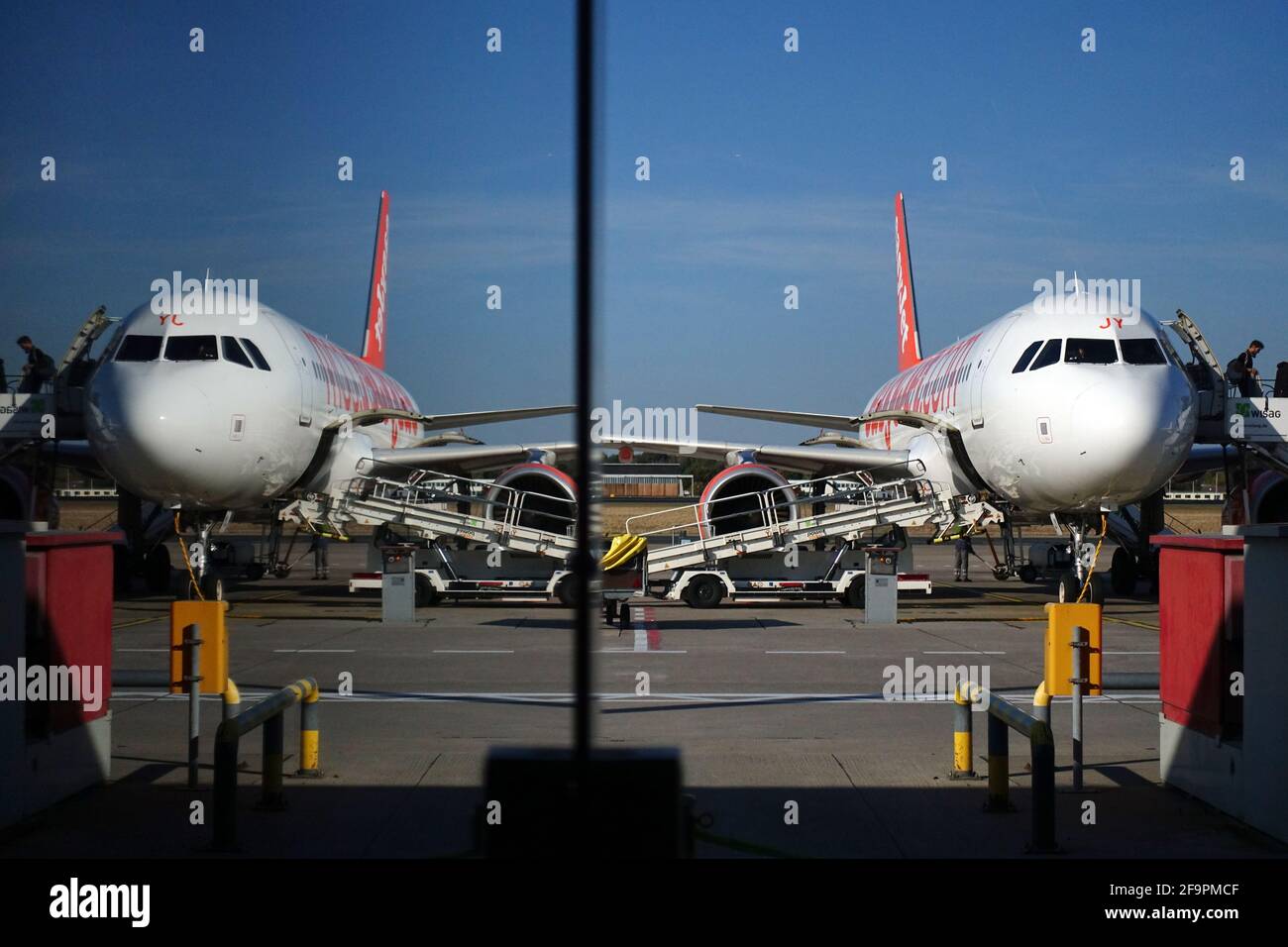 05.10.2018, Berlin, , Germany - Plane of the airline easyjet reflected ...