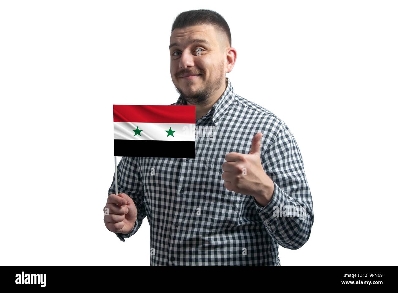 White guy holding a flag of Syria and shows the class by hand isolated ...