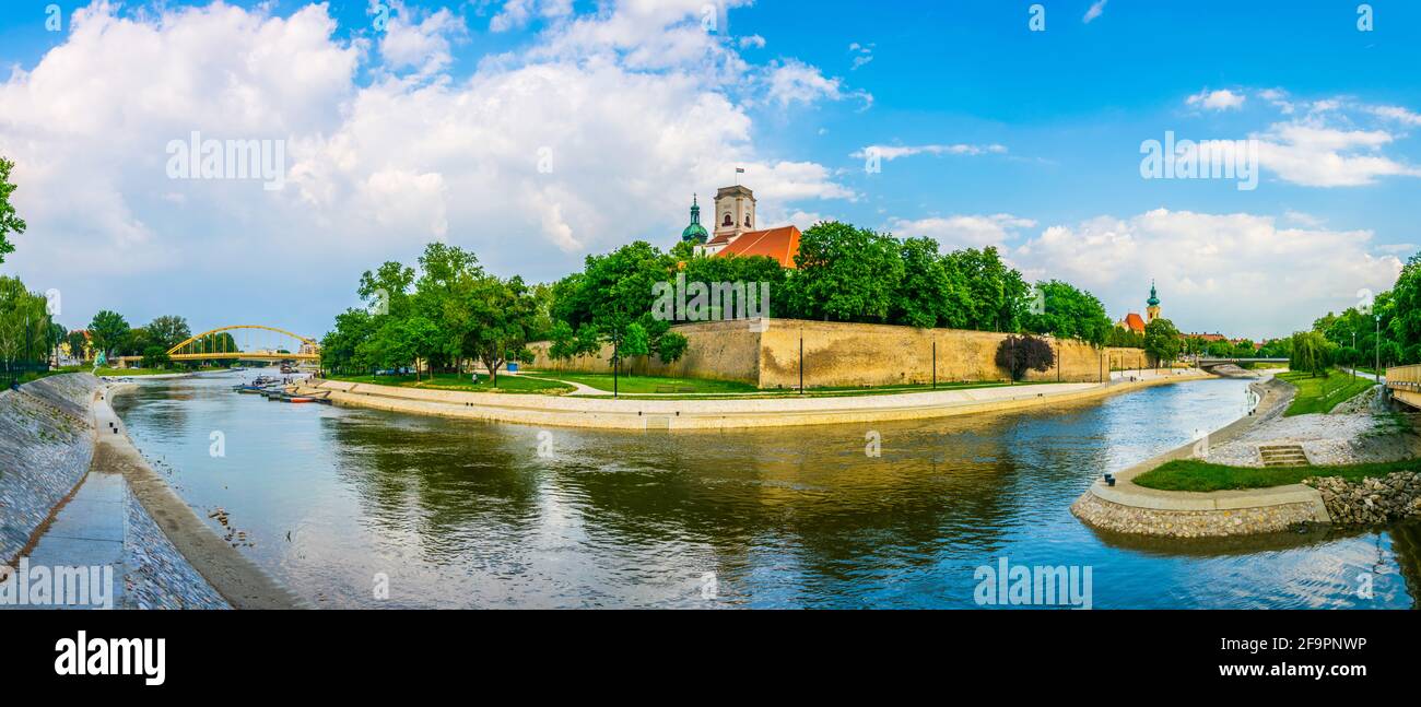bishop castle and cathedral tower over the river in gyor city in ...