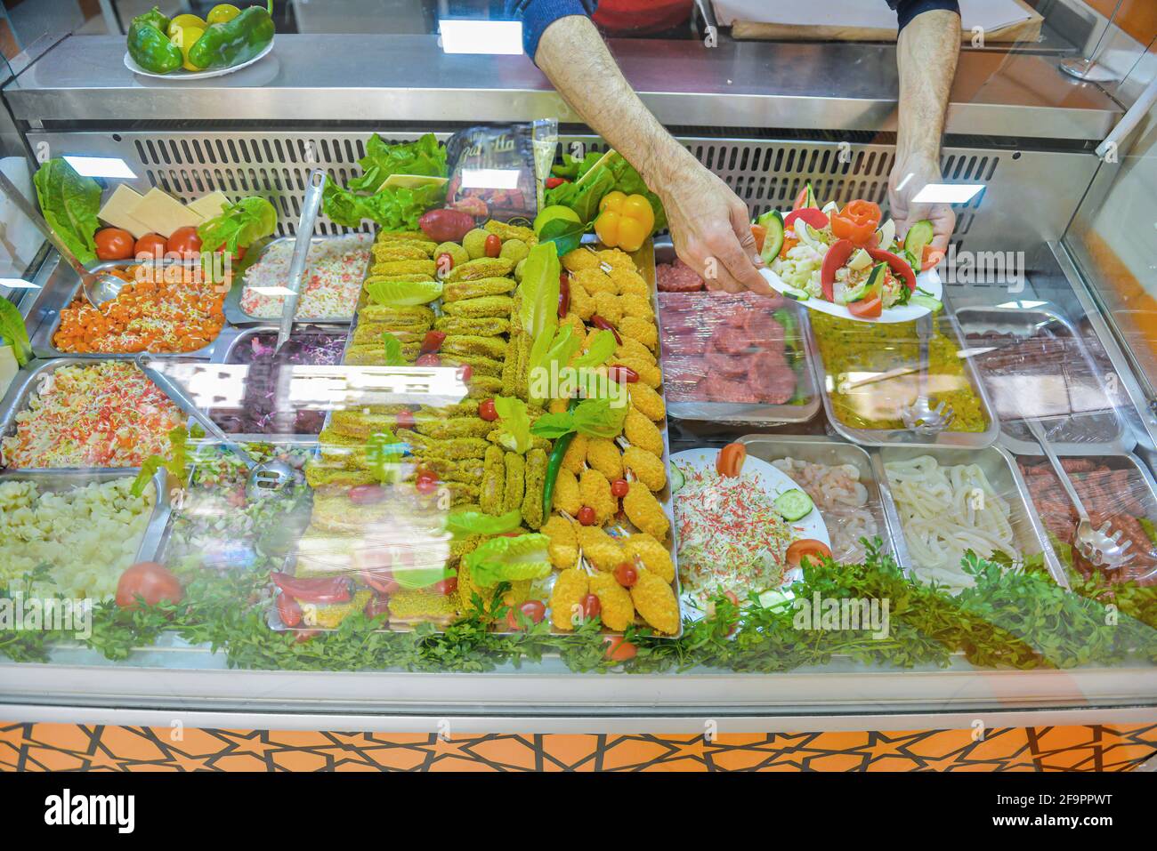 Sandwich shop. Various cuisines at the front of a sandwich shop in ...