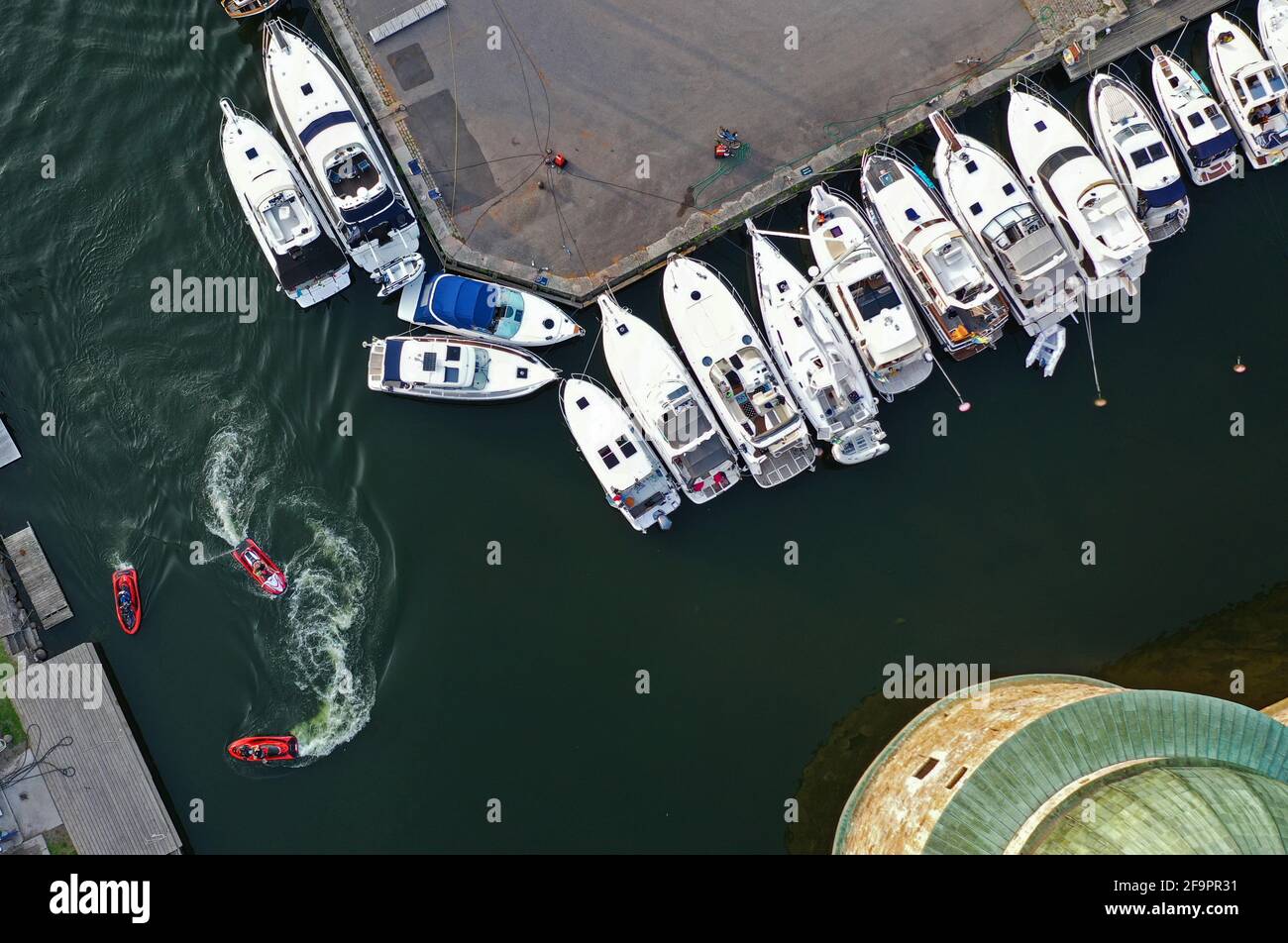 Boats and jet skis in the moat to Vadstena Castle Stock Photo - Alamy
