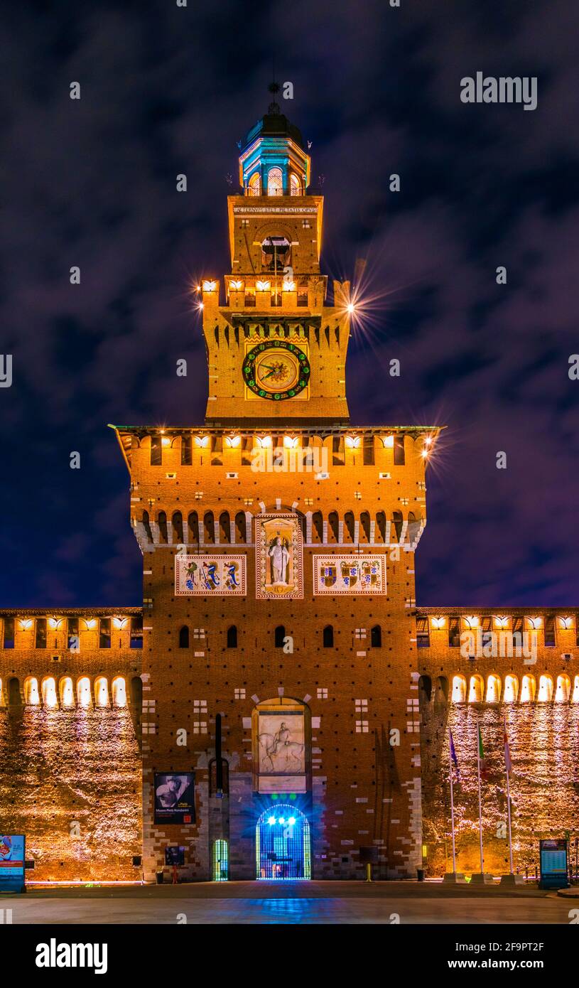 night view of the illuminated castello sforzesco in milano Stock Photo ...