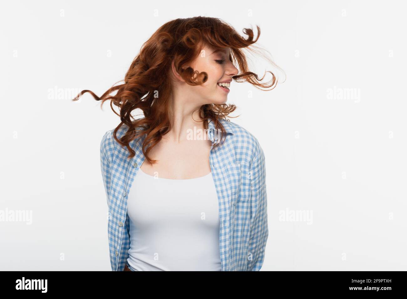 Woman shaking hair red hi-res stock photography and images - Alamy