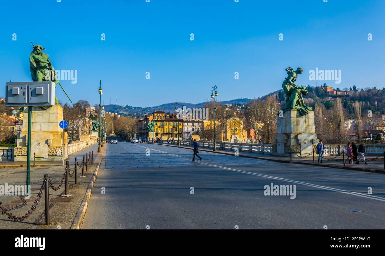 ponte umberto I bridge over river po with cityscape of torino, italy ...